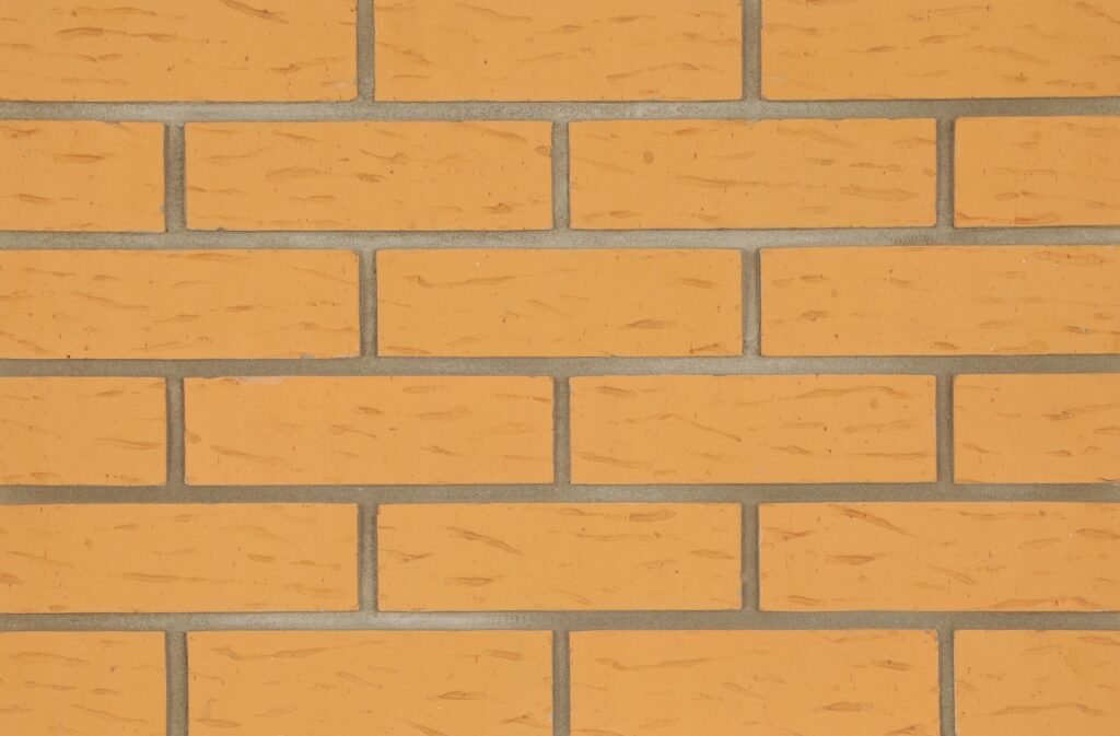 Enhance Your Space With Rustic Yellow Brick Cladding